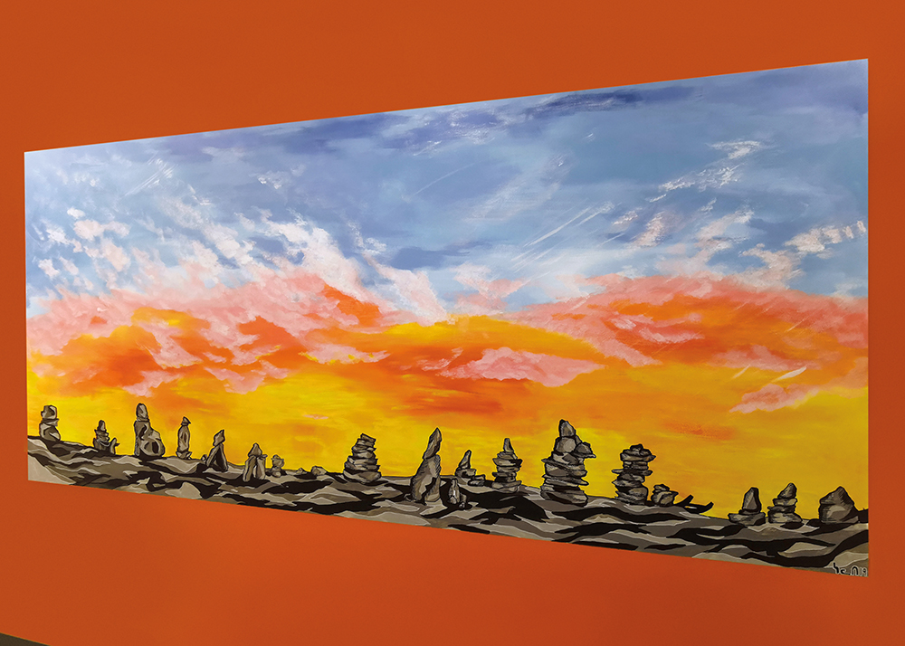 Arviat Mural Artist Gives Hamlet Office a Makeover